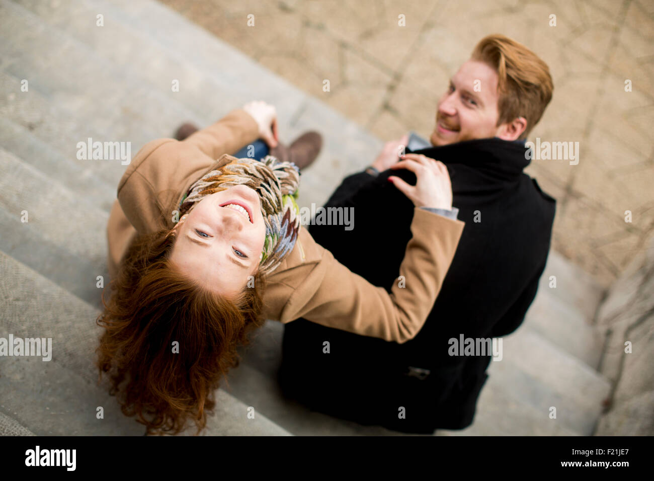 Young red hair couple at autumn park Stock Photo - Alamy