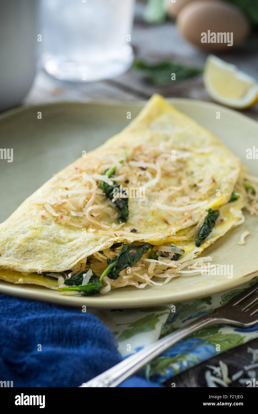 Delicious savory egg omelette with spinach Stock Photo - Alamy