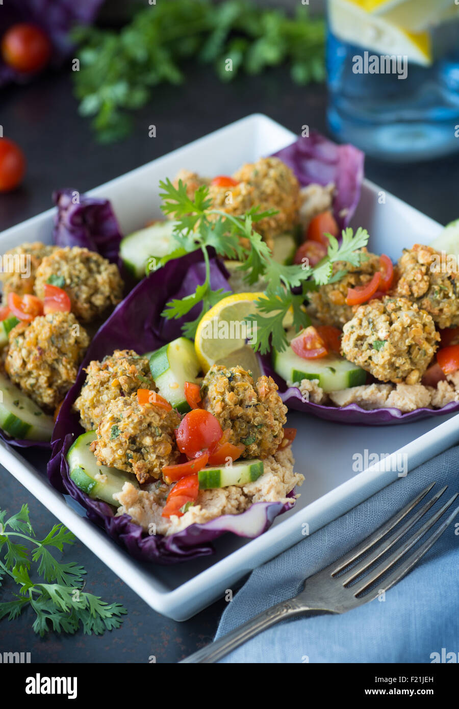 Greek style lunch falafel cabbage cups with hummus Stock Photo - Alamy