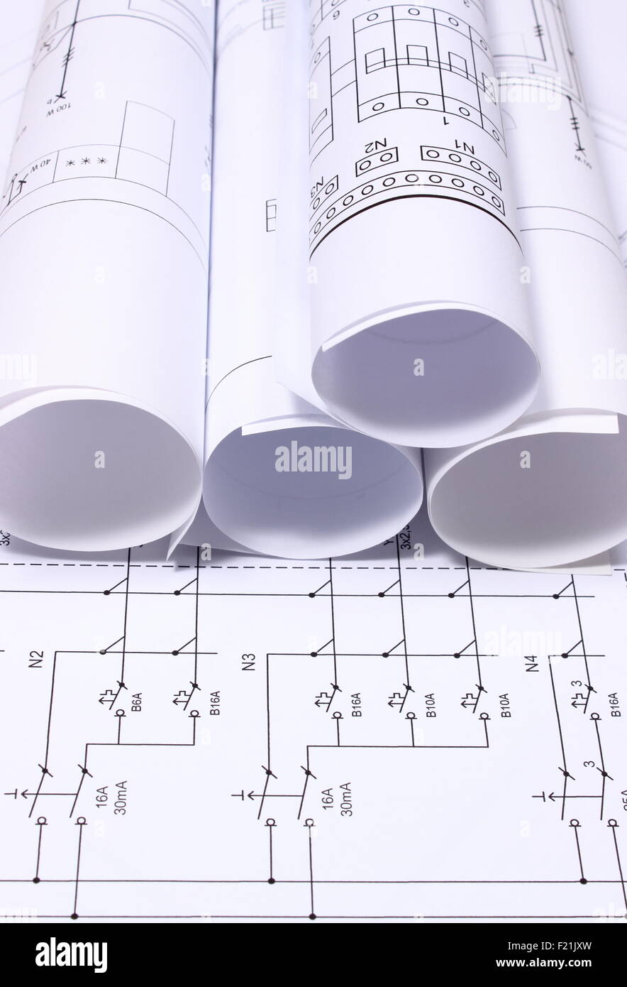 Rolls of electrical diagrams on construction drawing, drawings for the ...