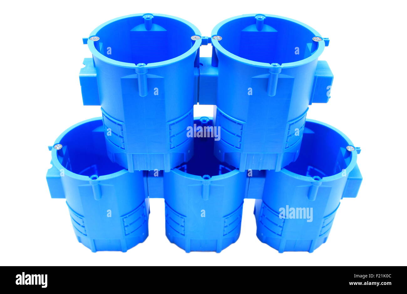 Stack of blue plastic electrical boxes on white background, junction ...