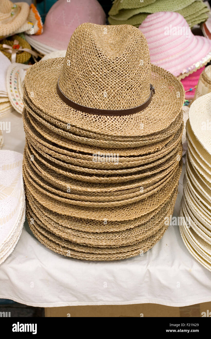 Stack of wicker hats in a street market Stock Photo - Alamy