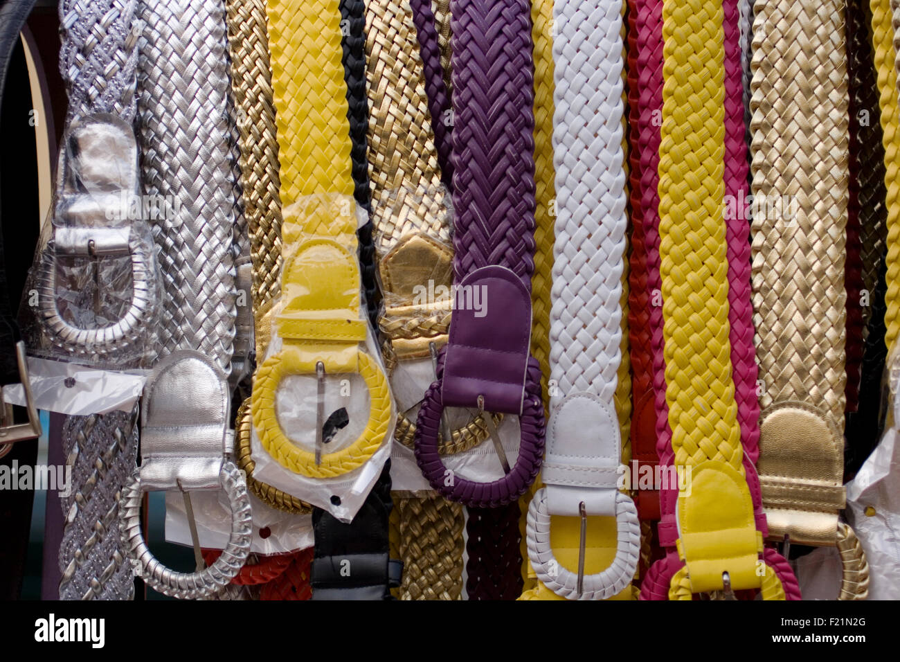 Colorful belts in a street market Stock Photo - Alamy