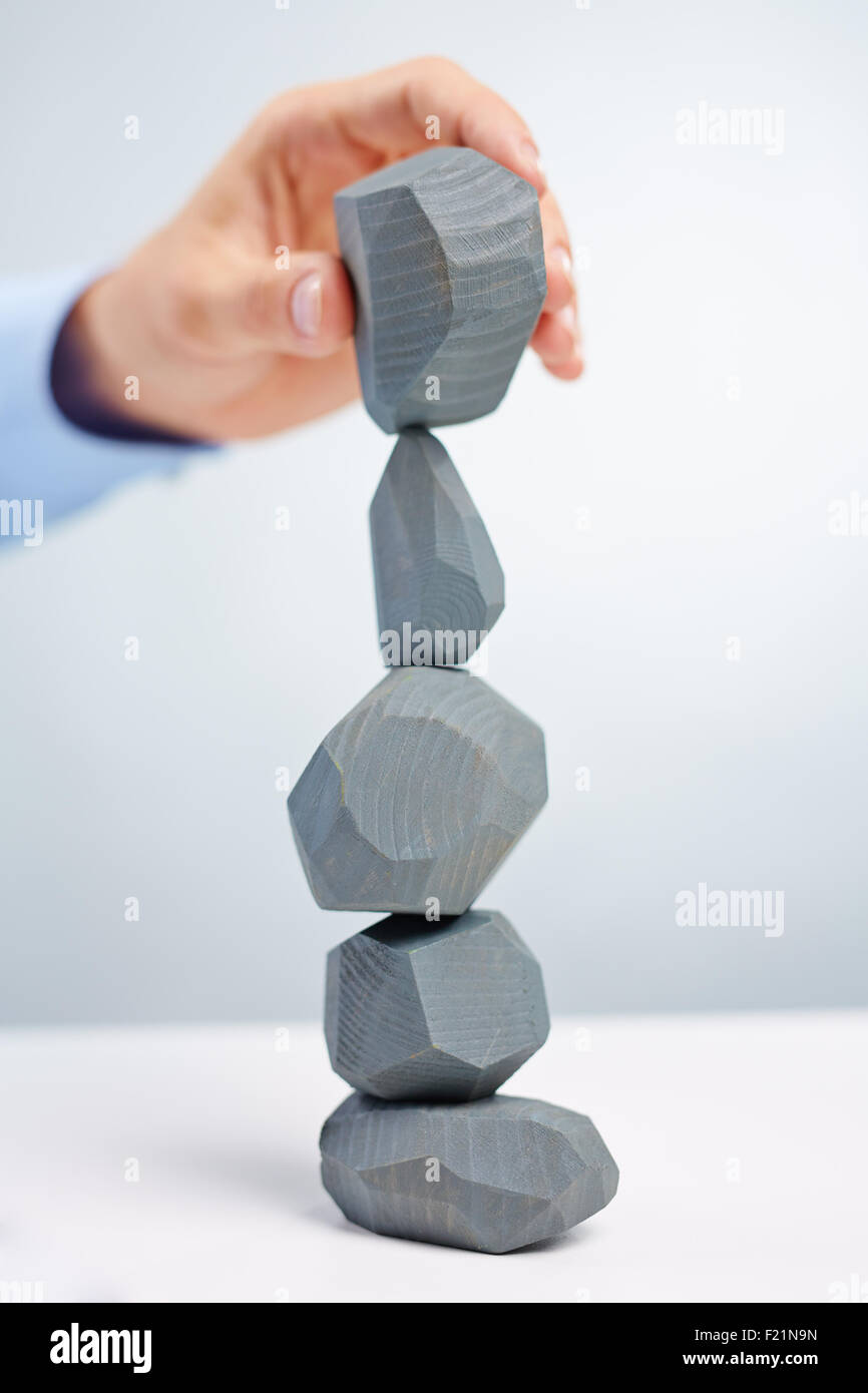 Putting the stone hi-res stock photography and images - Alamy