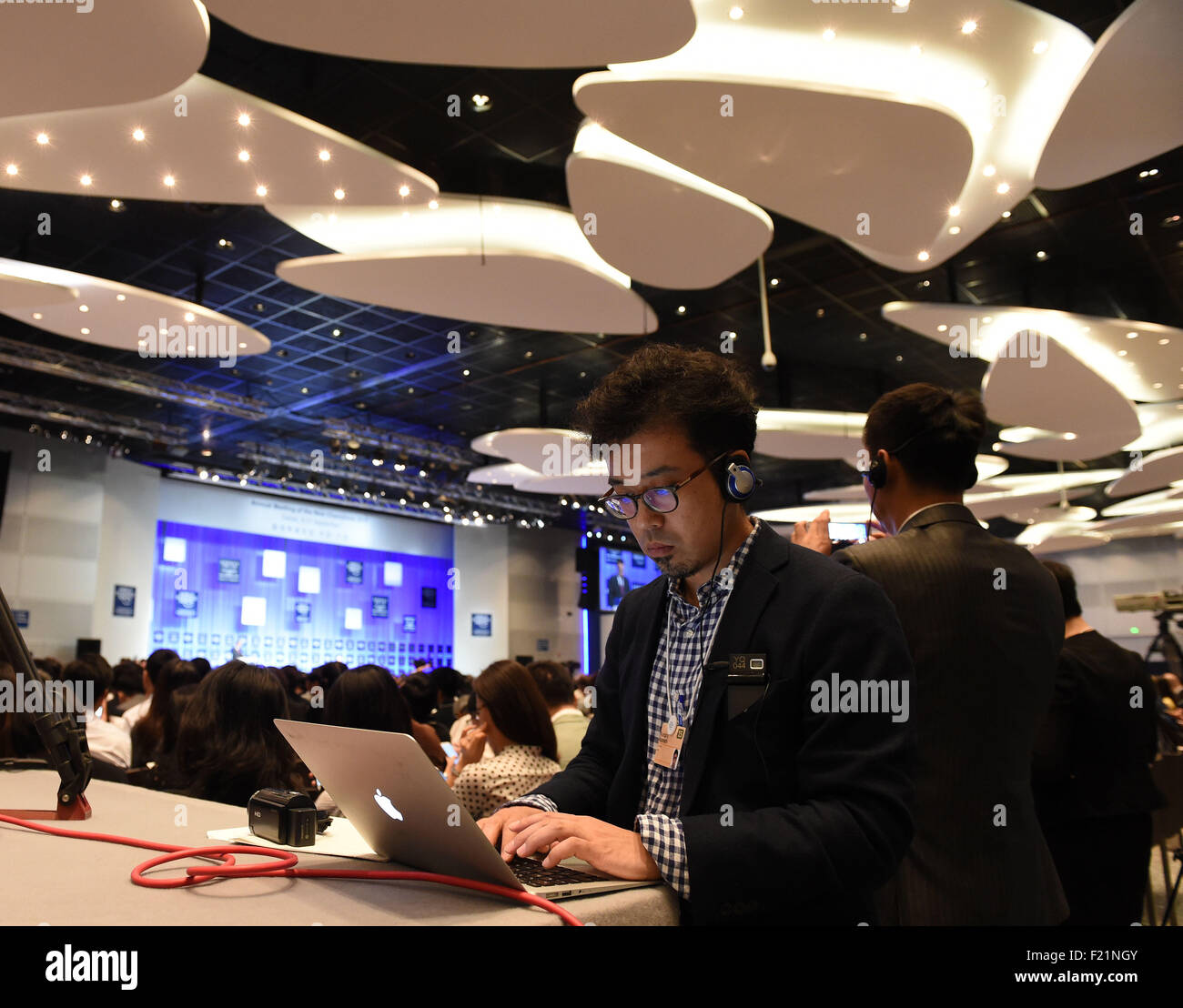 Dalian, China's Liaoning Province. 10th Sep, 2015. Journalists work at ...