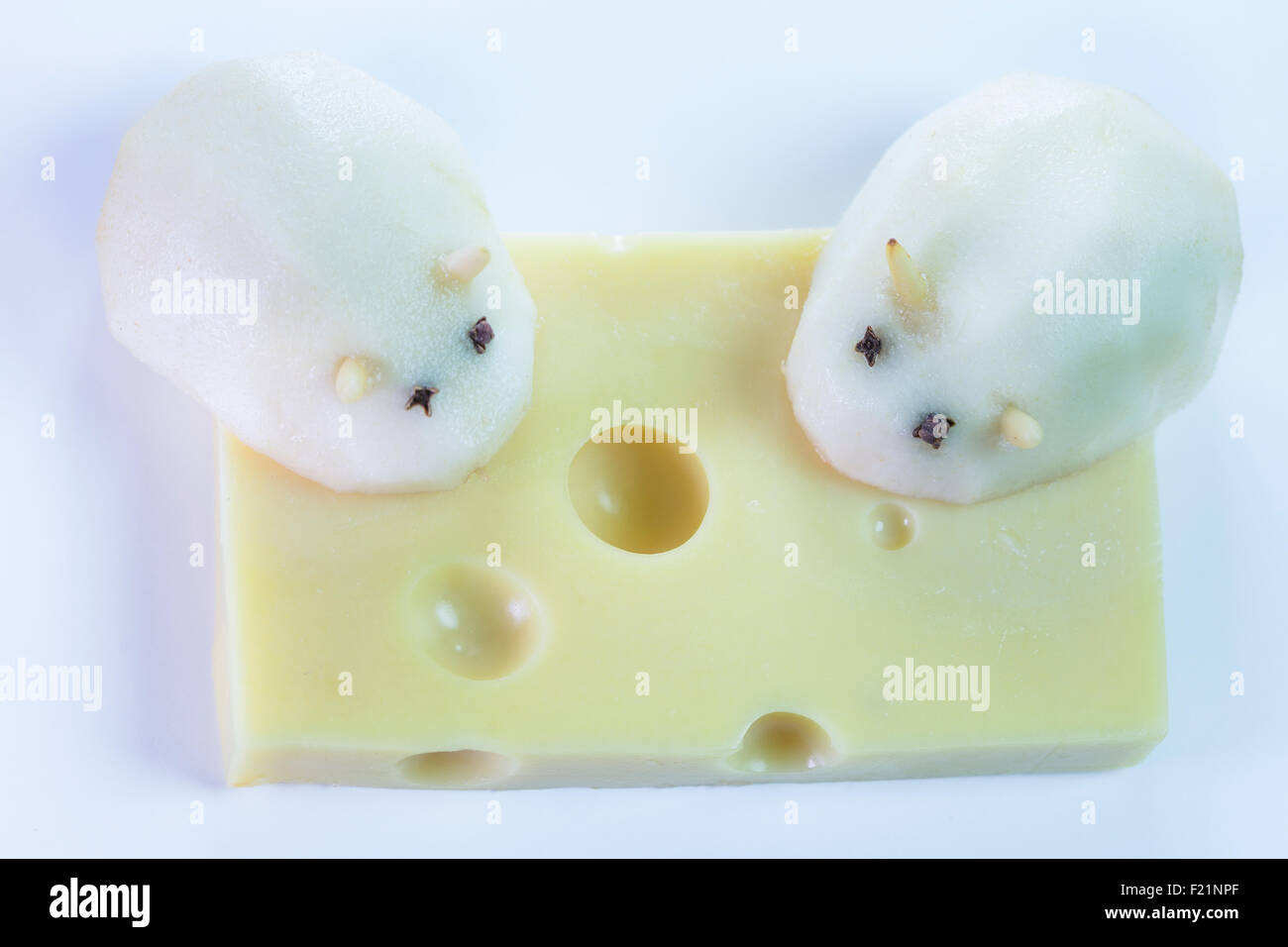 mouse of pear on cheese Stock Photo - Alamy