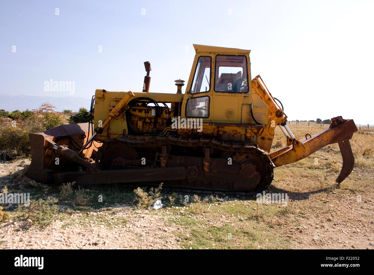 Old Caterpillar on a countryside Stock Photo - Alamy