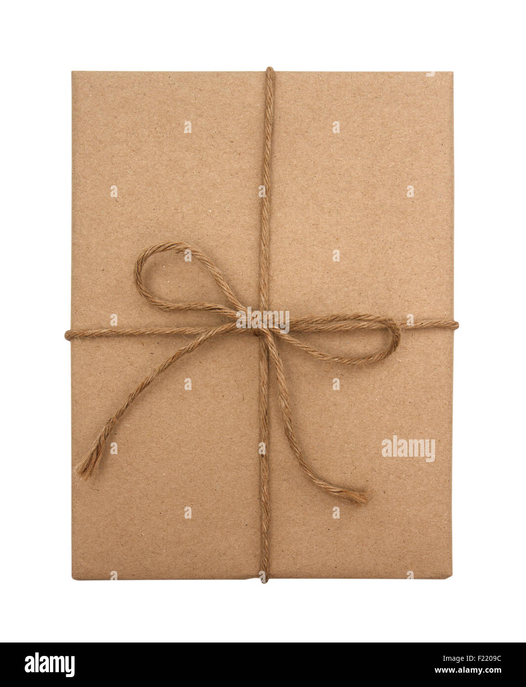 Brown paper package tied with string on a white background Stock Photo ...