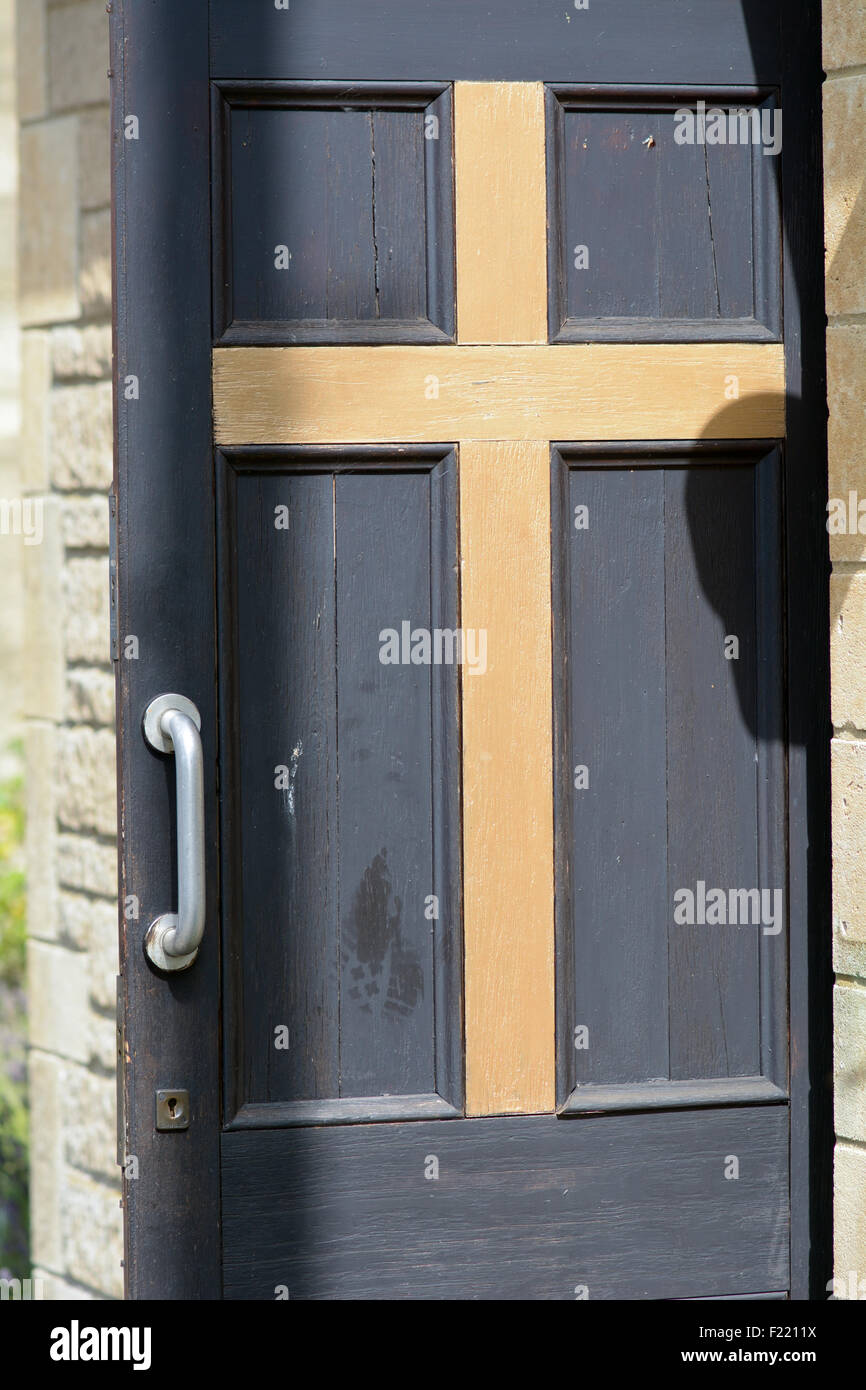 Christian cross shape in church door Stock Photo - Alamy