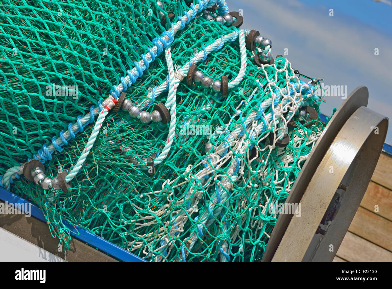 a pile of fishing nets in harbor Stock Photo - Alamy