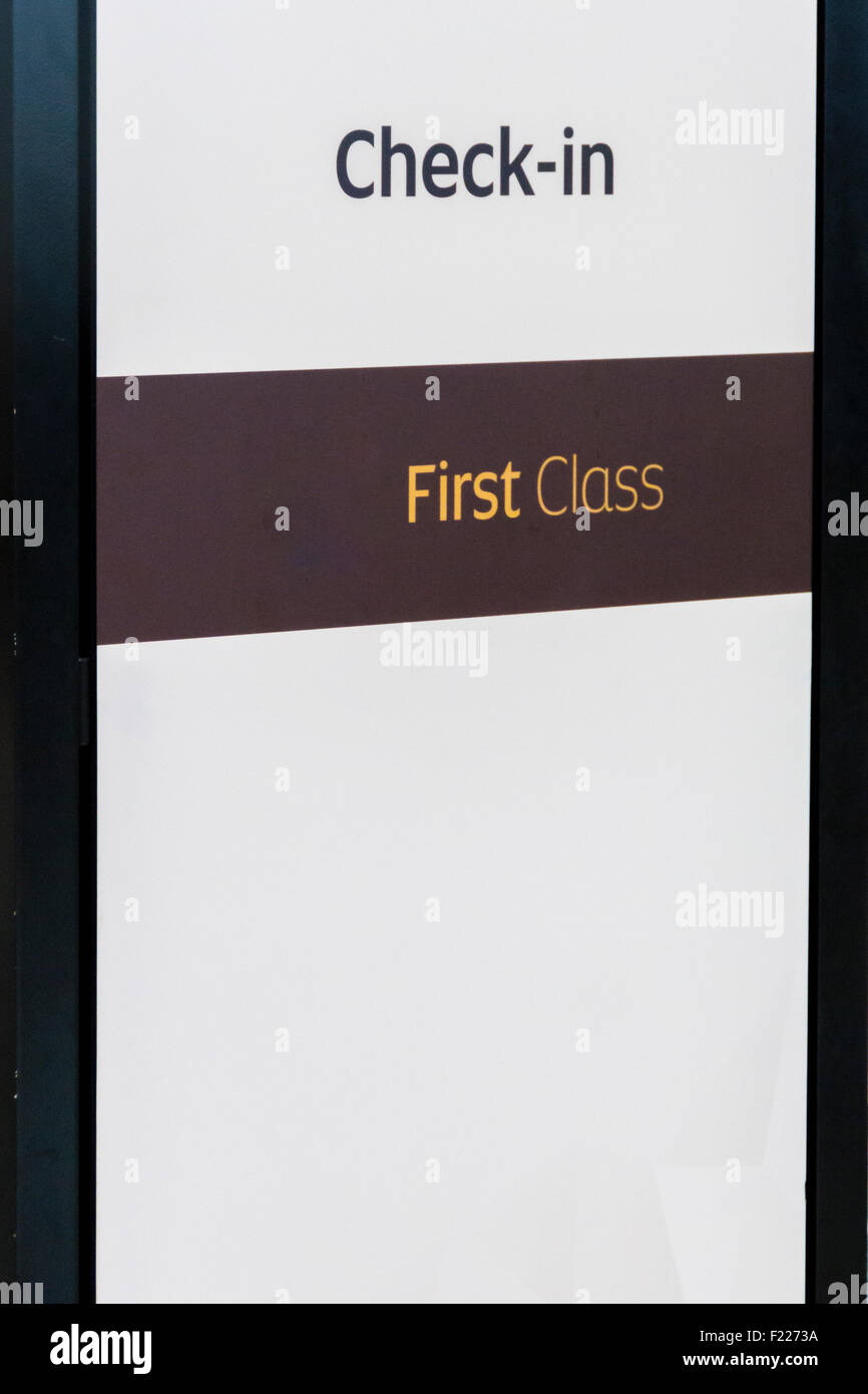 Sign on a first class check in desk at Heathrow airport, London Stock ...