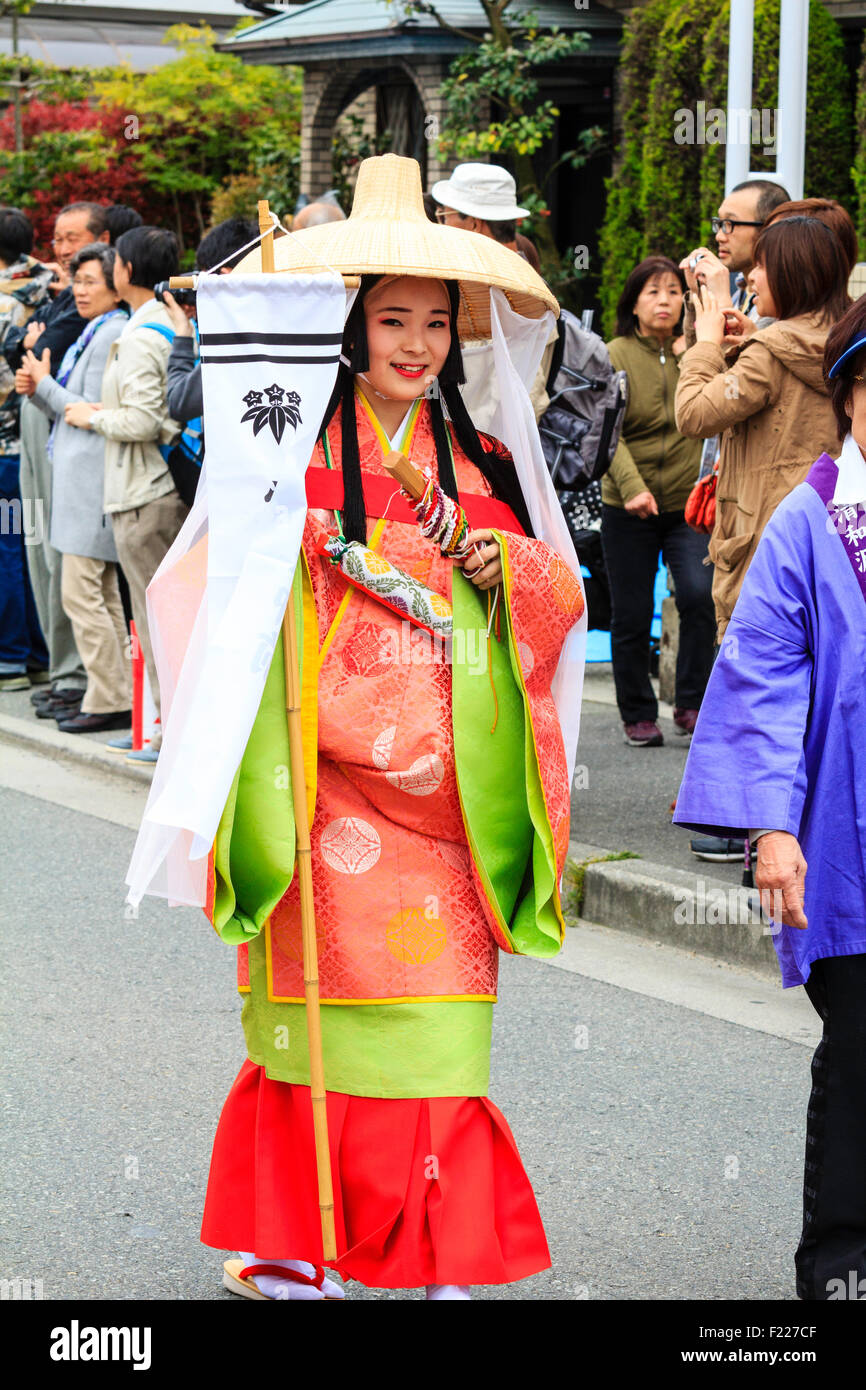 Japanese Genji festival in Tada. Young woman in the parade dressed in ...