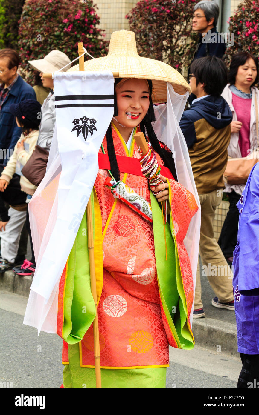 Japanese Genji festival in Tada. Young woman in the parade dressed in ...