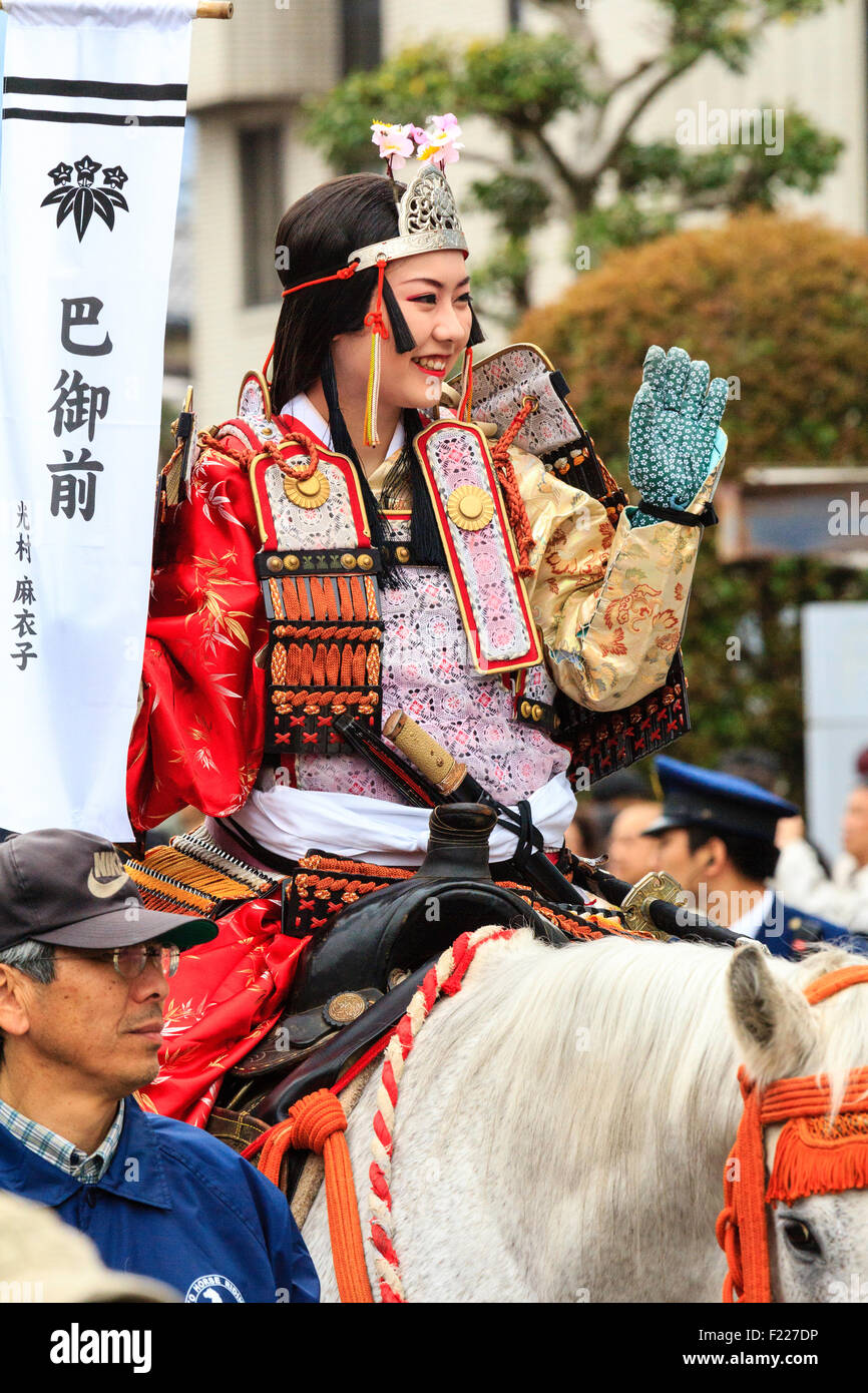 Genji festival parade in Japan. Close up of young woman on horseback ...