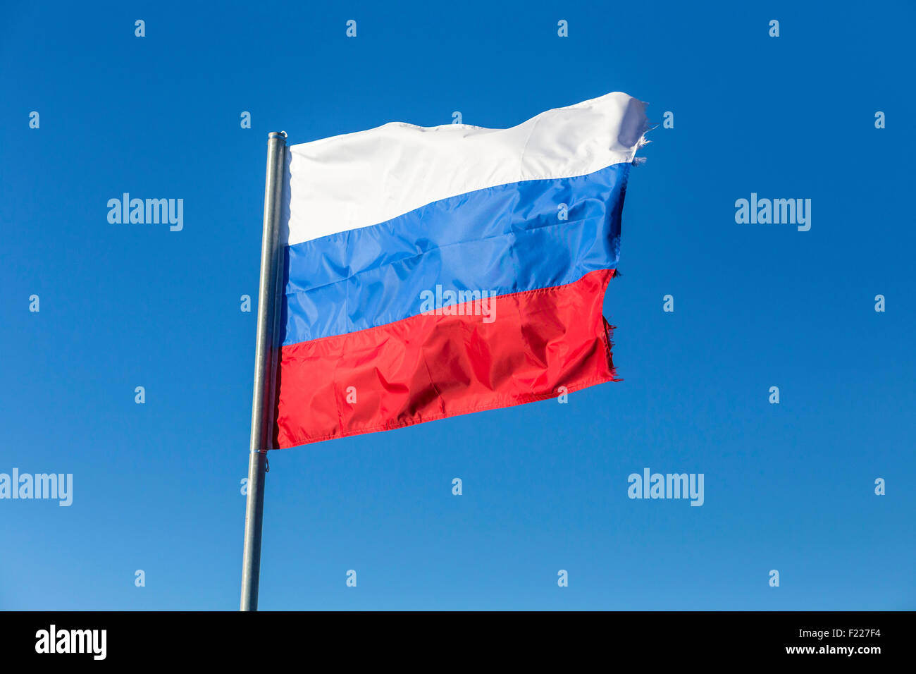 Russian flag in blue sky Stock Photo - Alamy