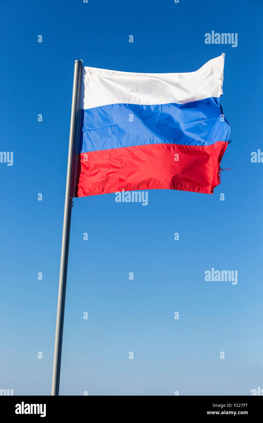 Russian flag in blue sky Stock Photo - Alamy