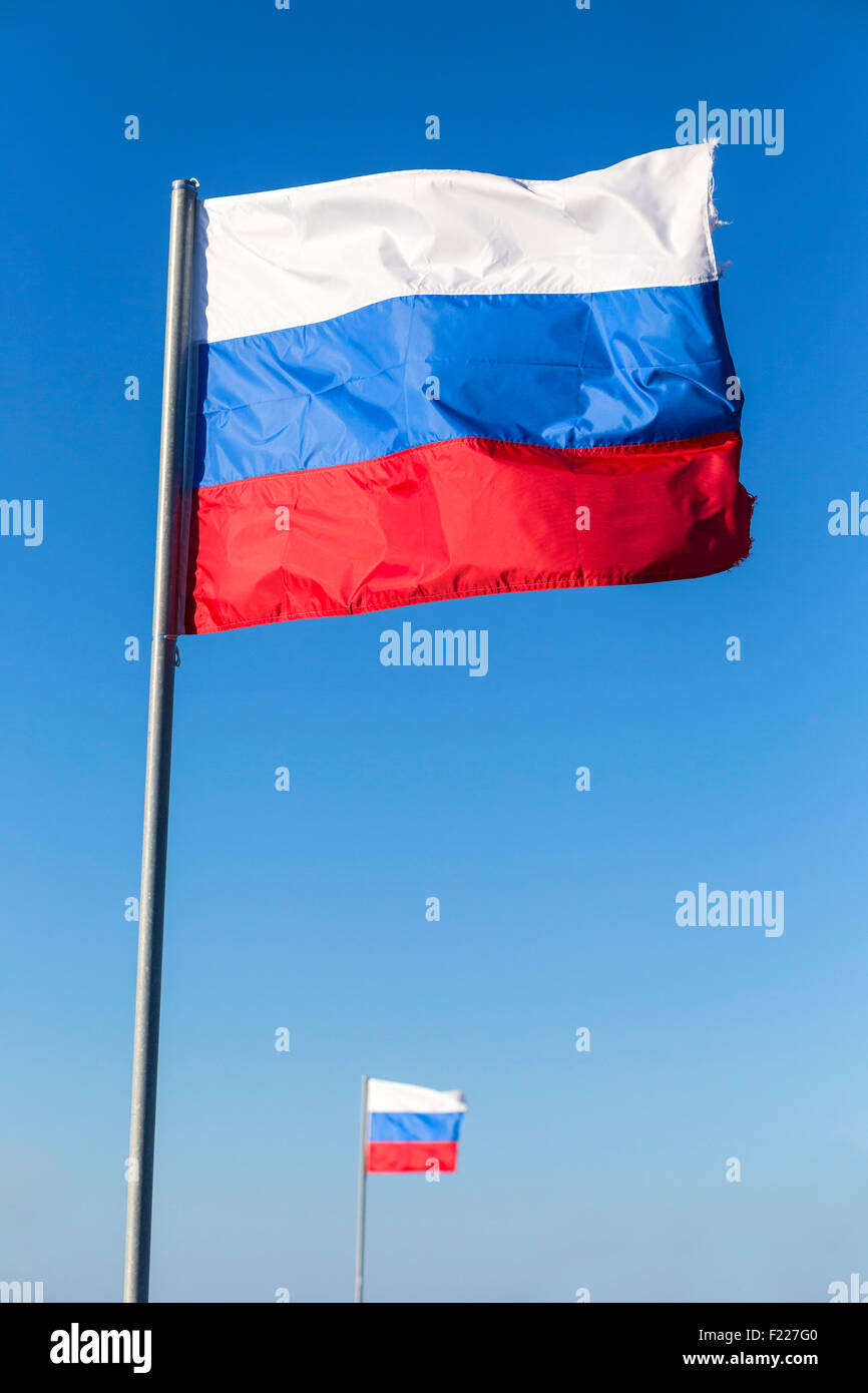 Russian flag in blue sky Stock Photo - Alamy