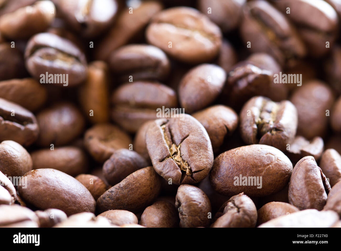 Background with many coffee beans Stock Photo - Alamy