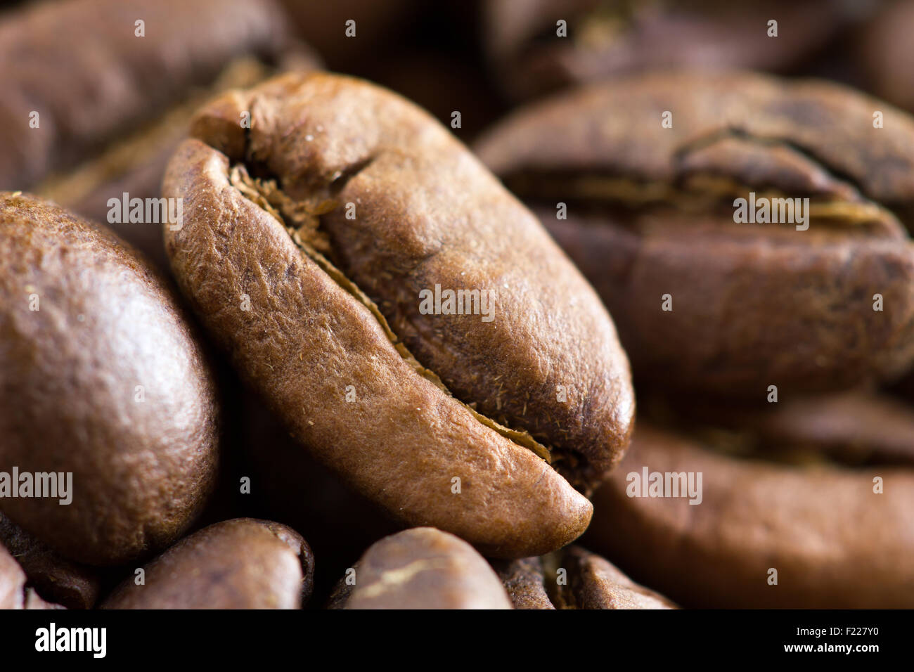 Background with many coffee beans Stock Photo - Alamy