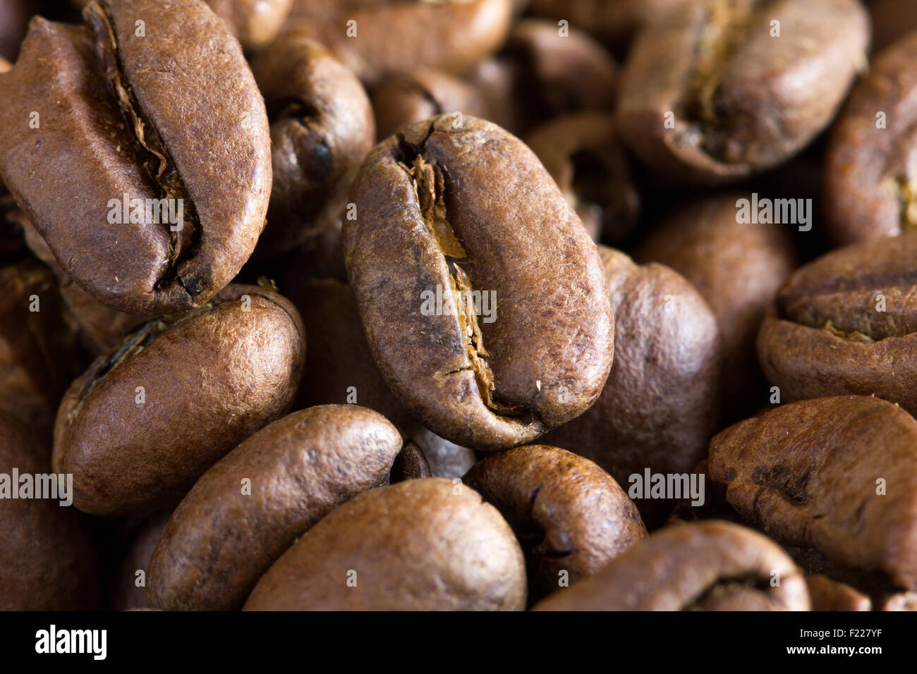 Background with many coffee beans Stock Photo - Alamy