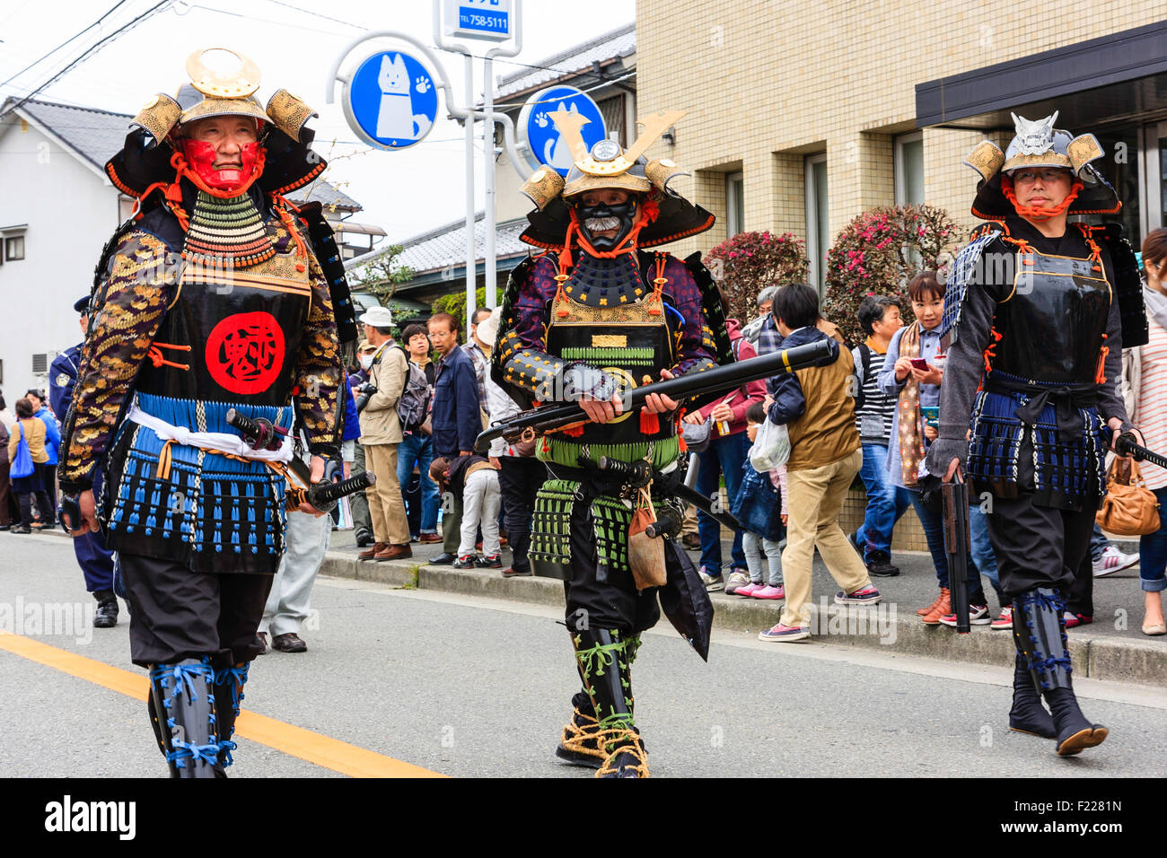 Tada Genji parade in Japan. Three Samurai, in revival armour and face ...