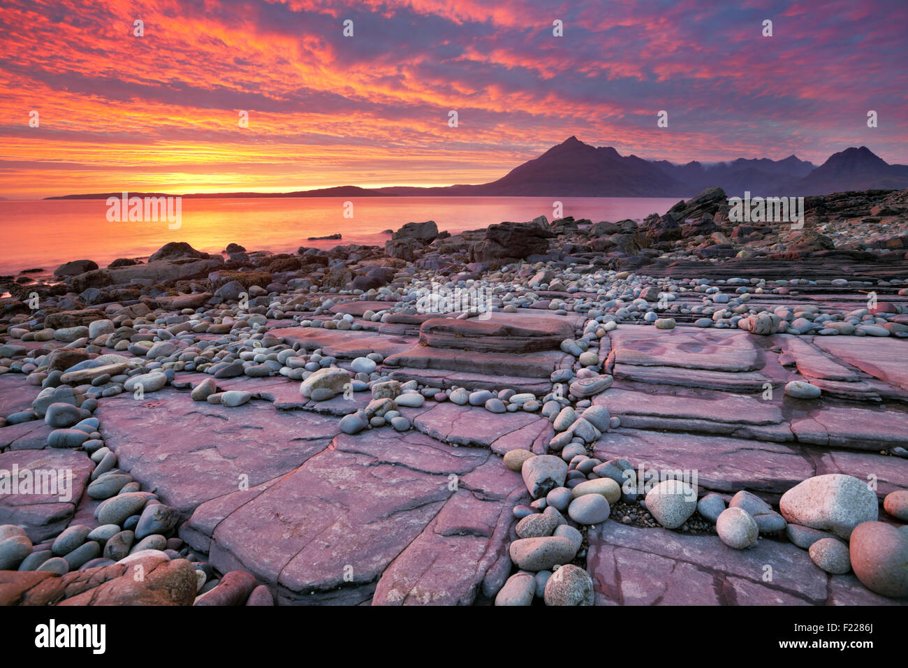 The beach of Elgol on the Isle of Skye, Scotland with The Cuillins in ...