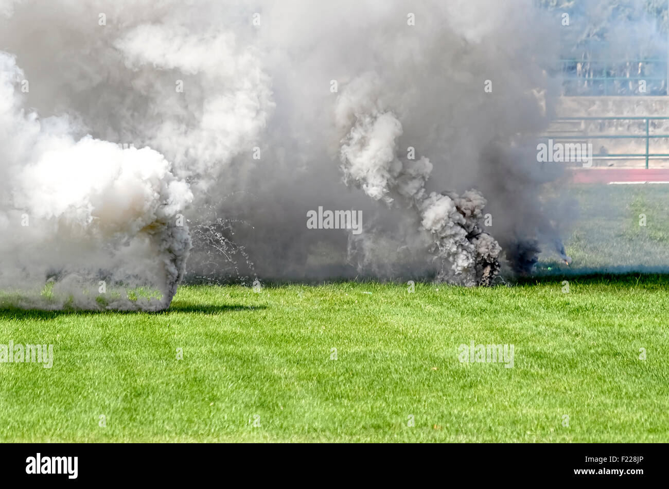 Smoke bombs hi-res stock photography and images - Alamy