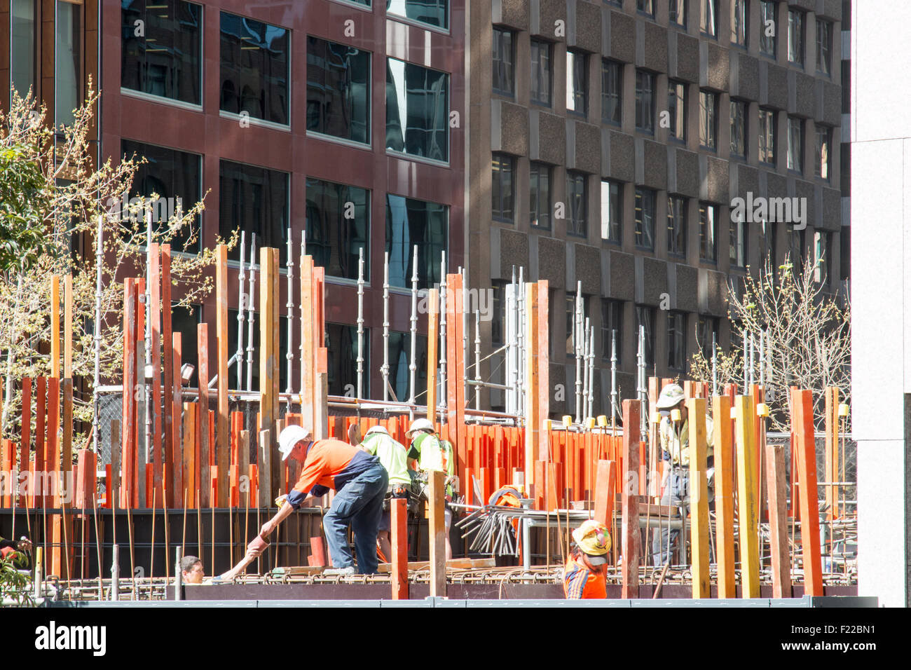 Australian building site workers on a construction site in Sydney city ...