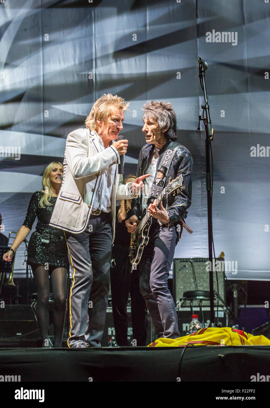 Rod Stewart and Ronnie Wood singing. The Faces, reunited, perform in concert live on stage ...