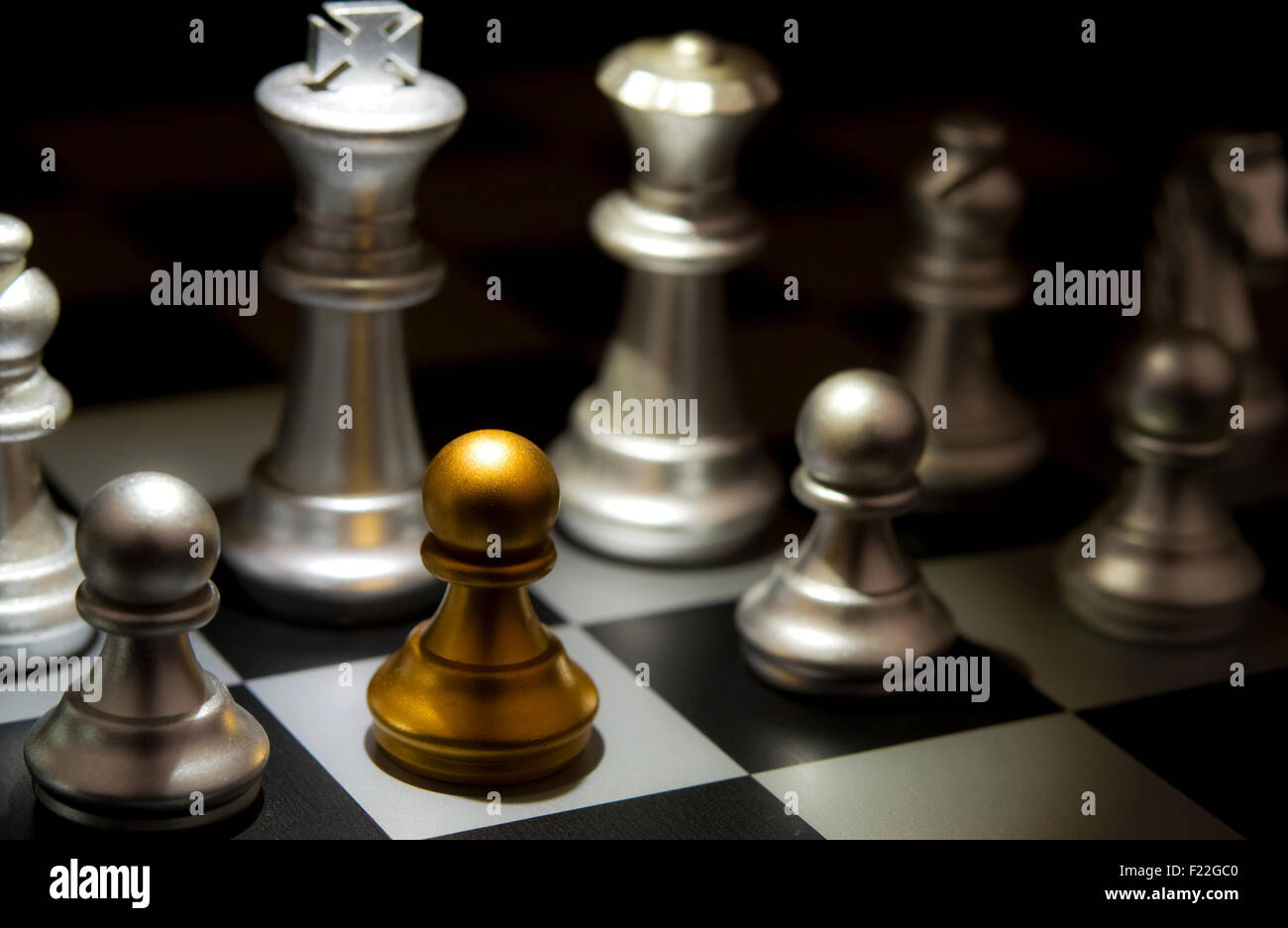 Stand out of a crowd individuality concept Odd Chess Piece Stock Photo ...