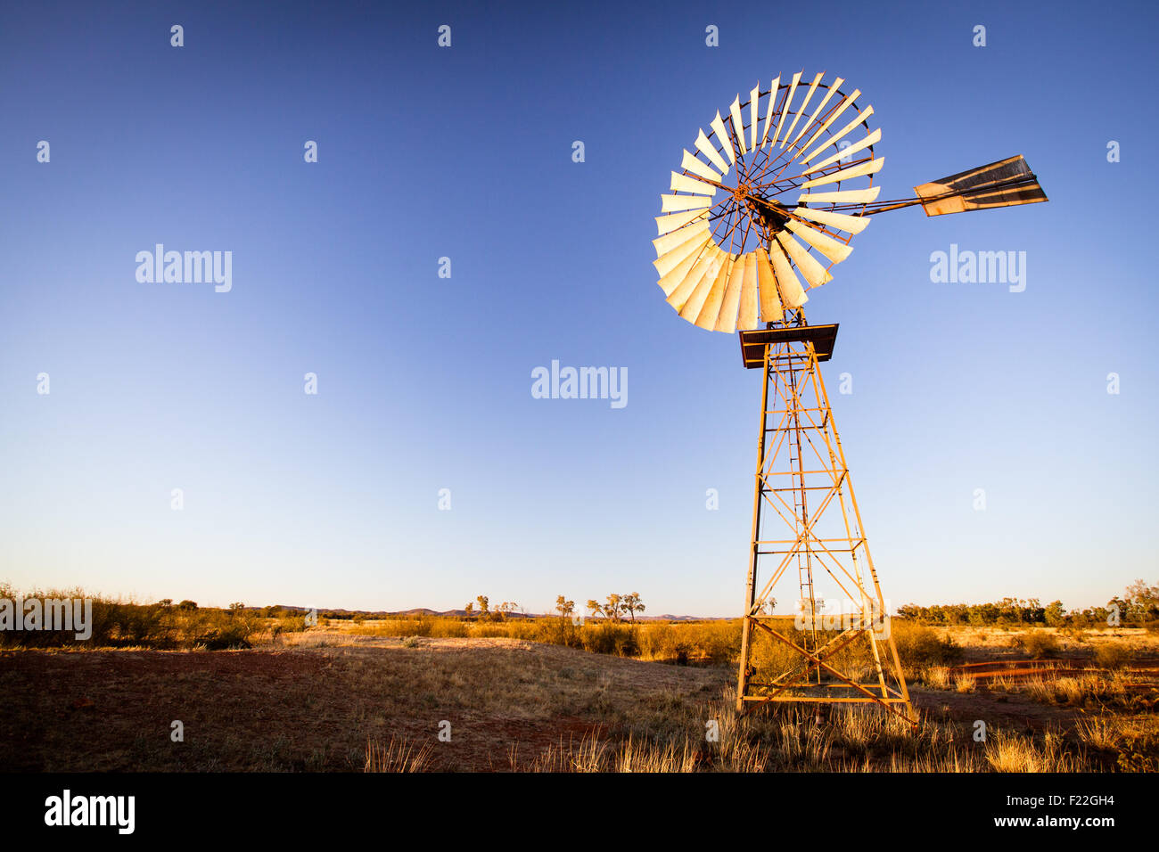 An old disused windmill at dawn near Gemtree, Northern Territory ...
