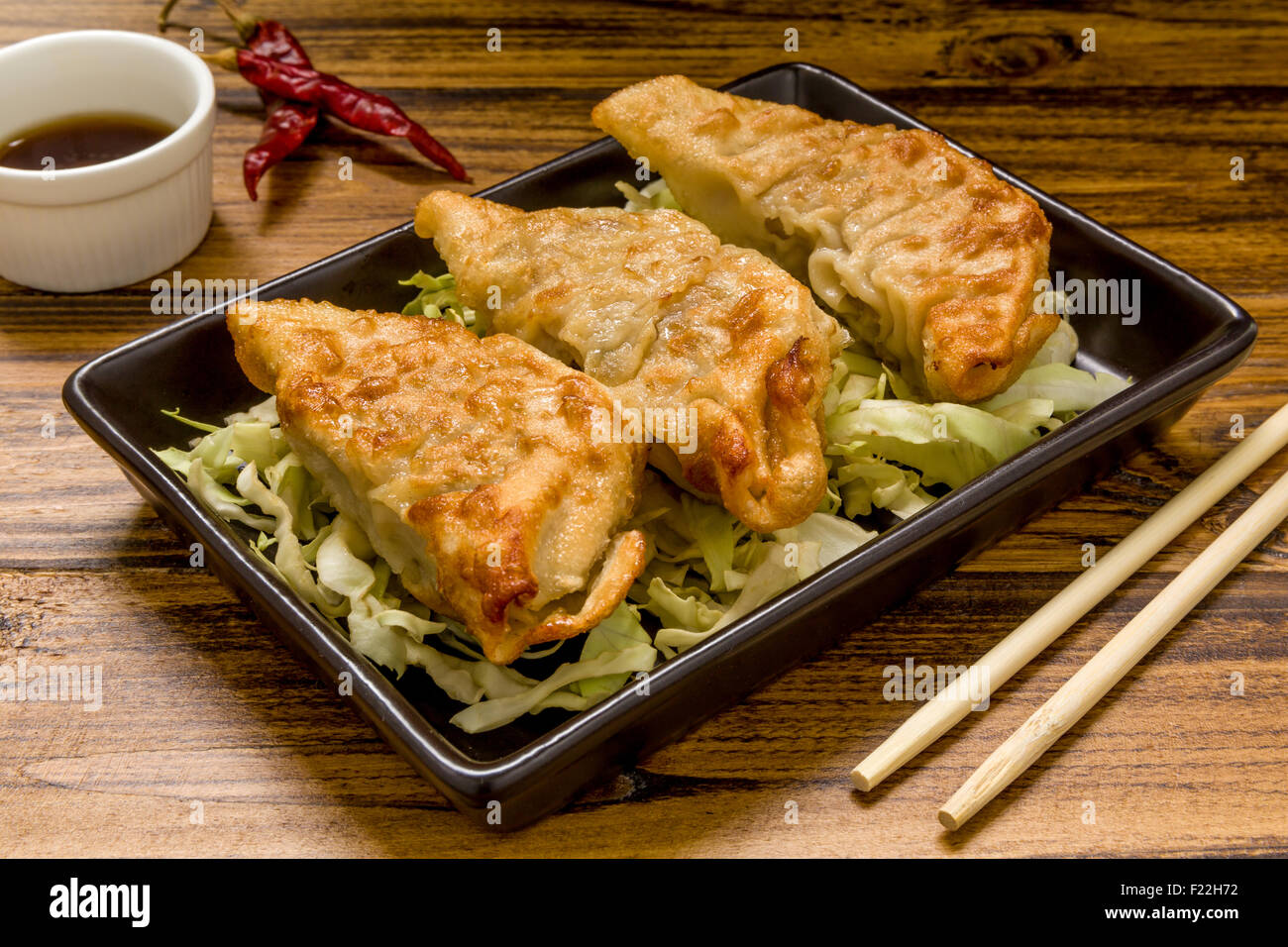 Gyoza, traditional pork dumpling, eaten with soy sauce popular in Japan ...