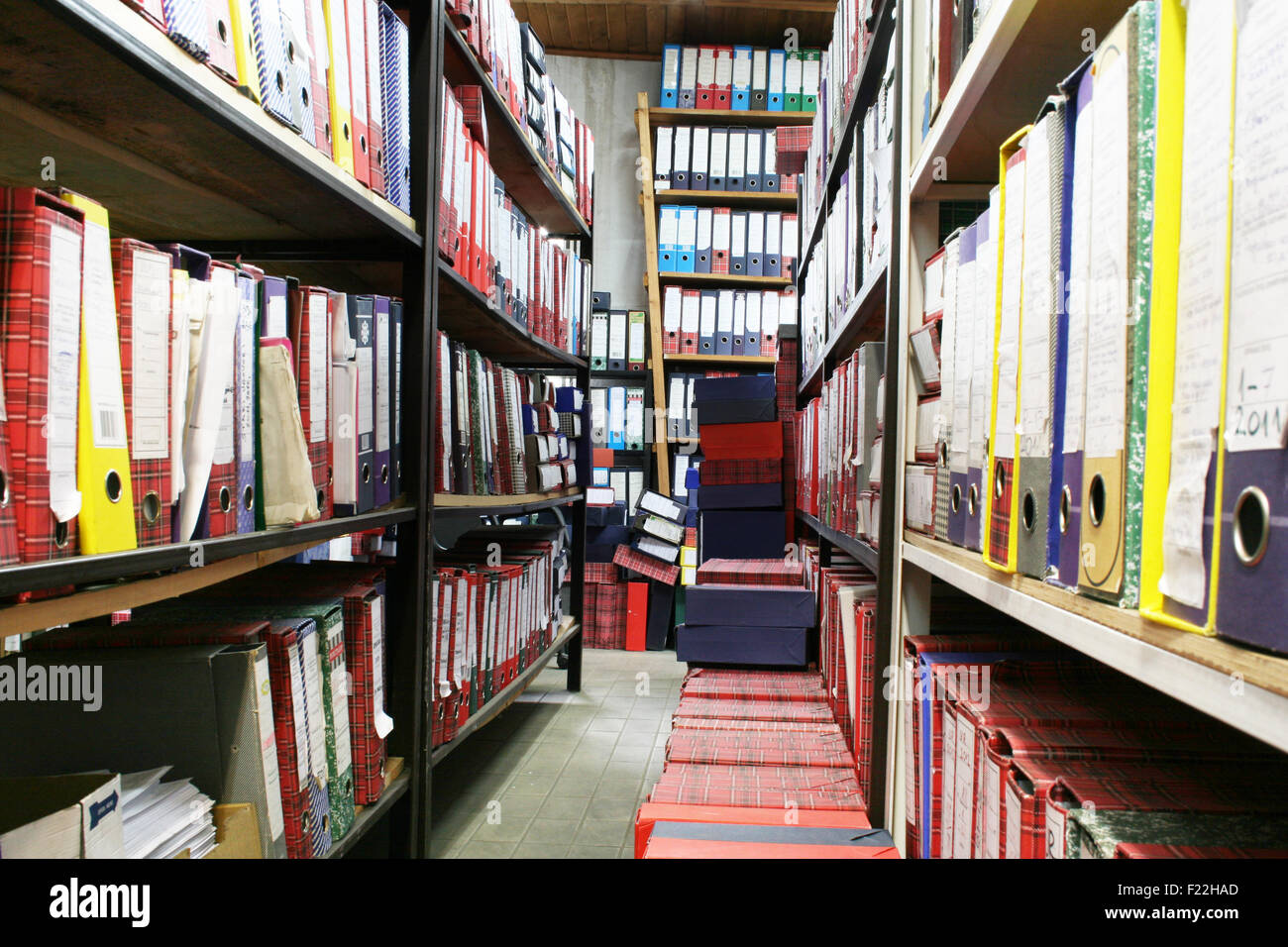 Shelves with file folders in an archive Stock Photo - Alamy