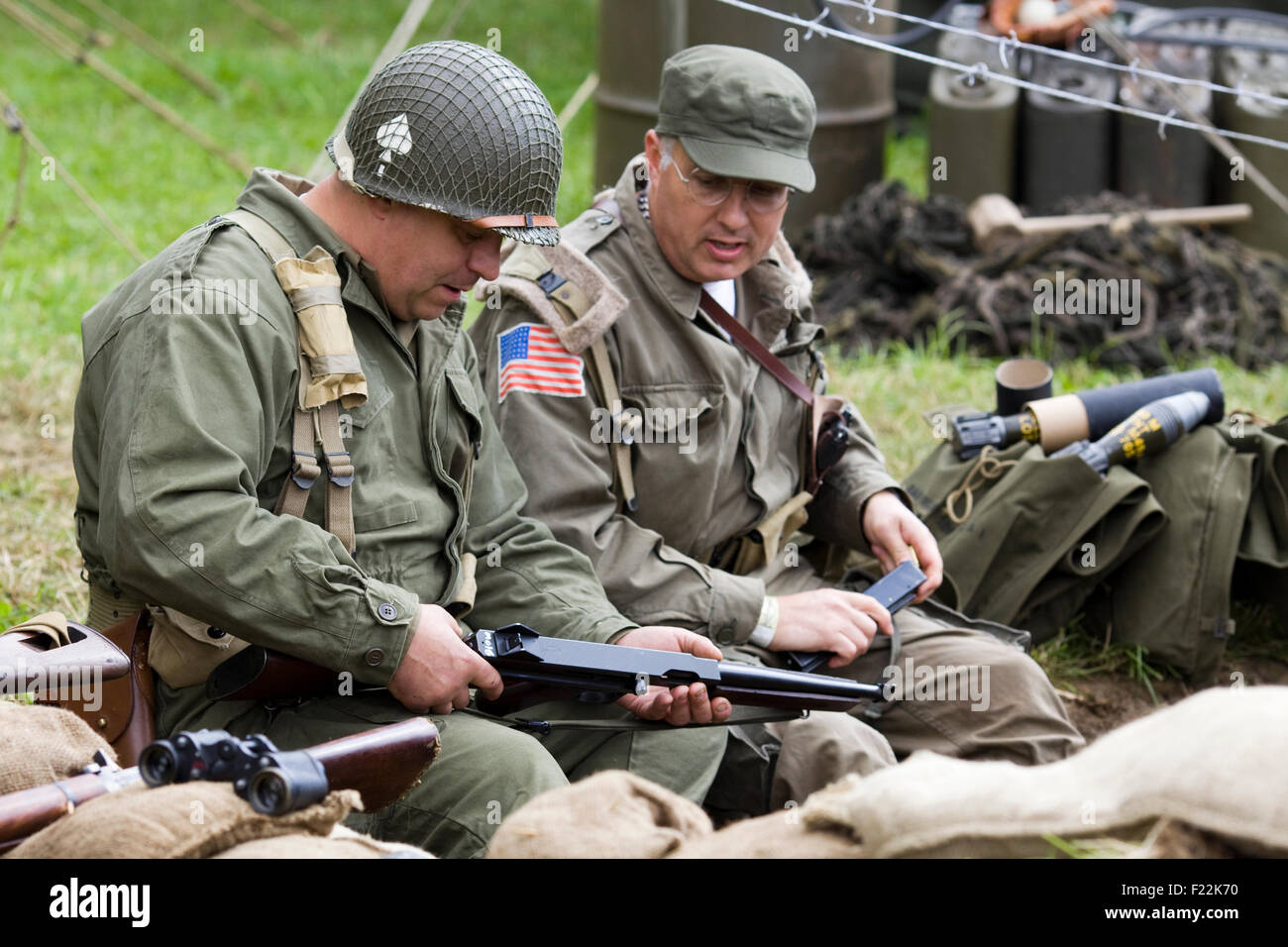 World war 11 soldiers checking weapons on the battlefield Stock Photo ...