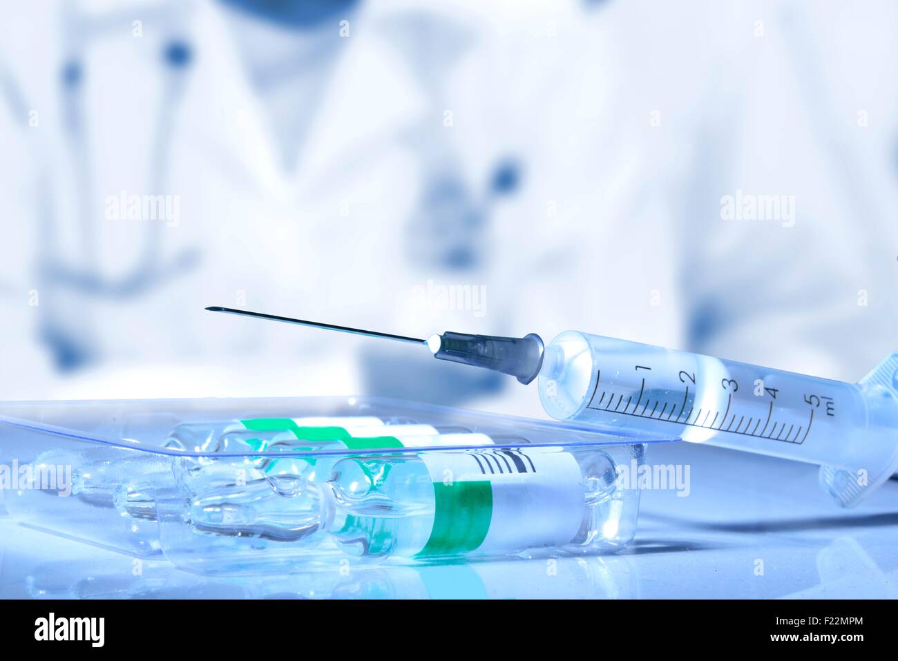plastic medical syringe and ampoule with needle before make drug ...