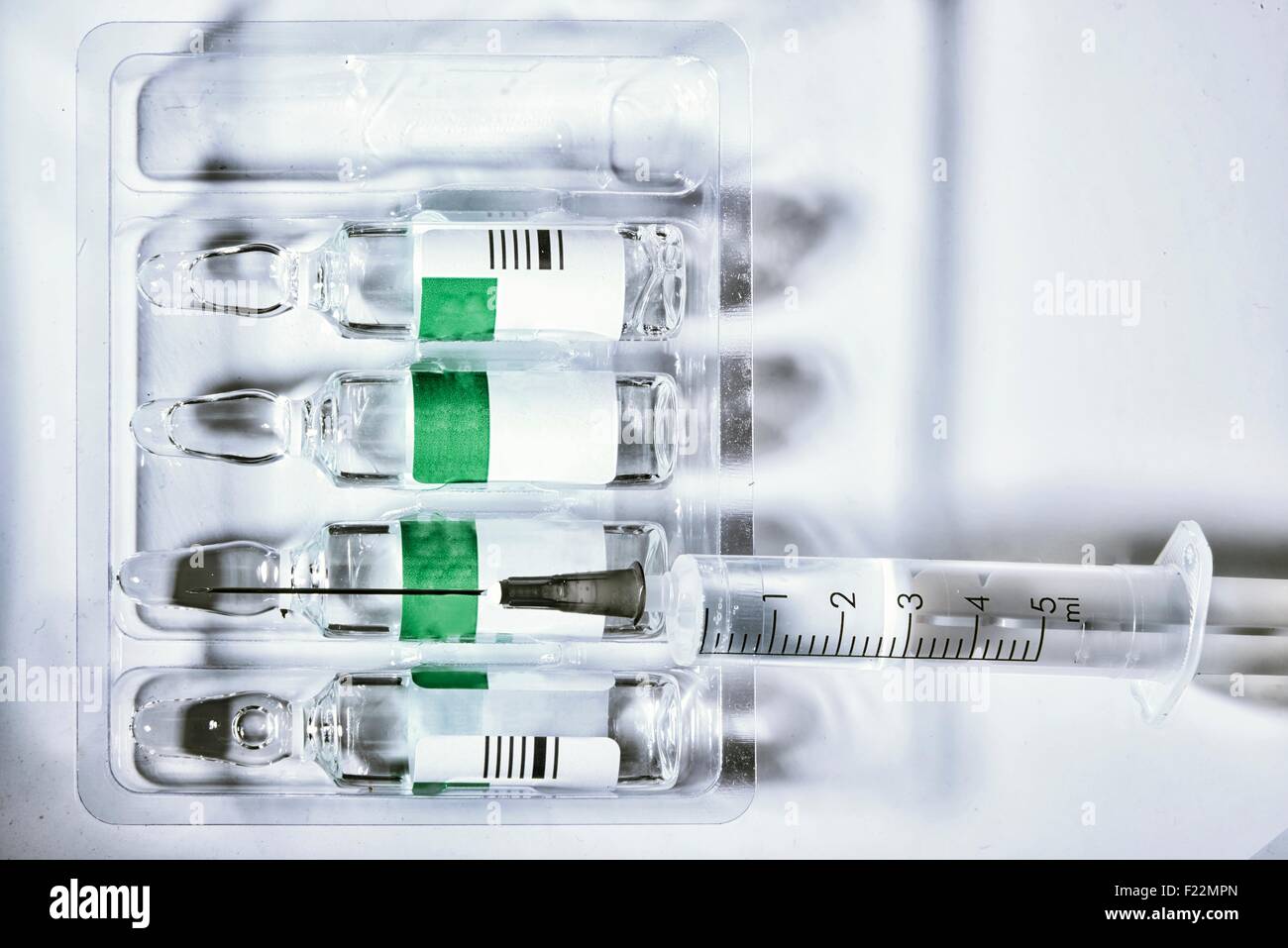 plastic medical syringe and ampoule with needle before make drug ...