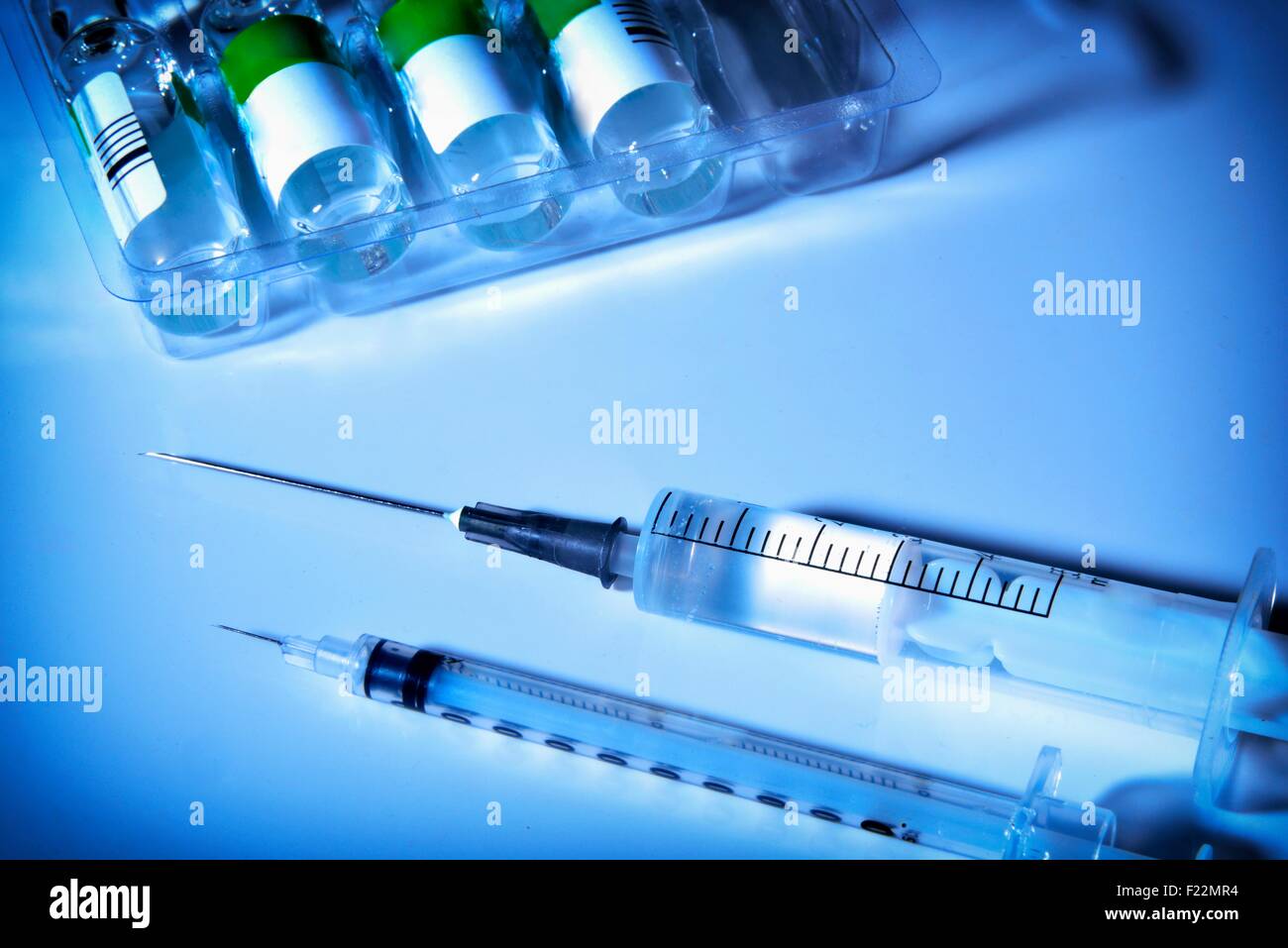 plastic medical syringe and ampoule with needle before make drug ...