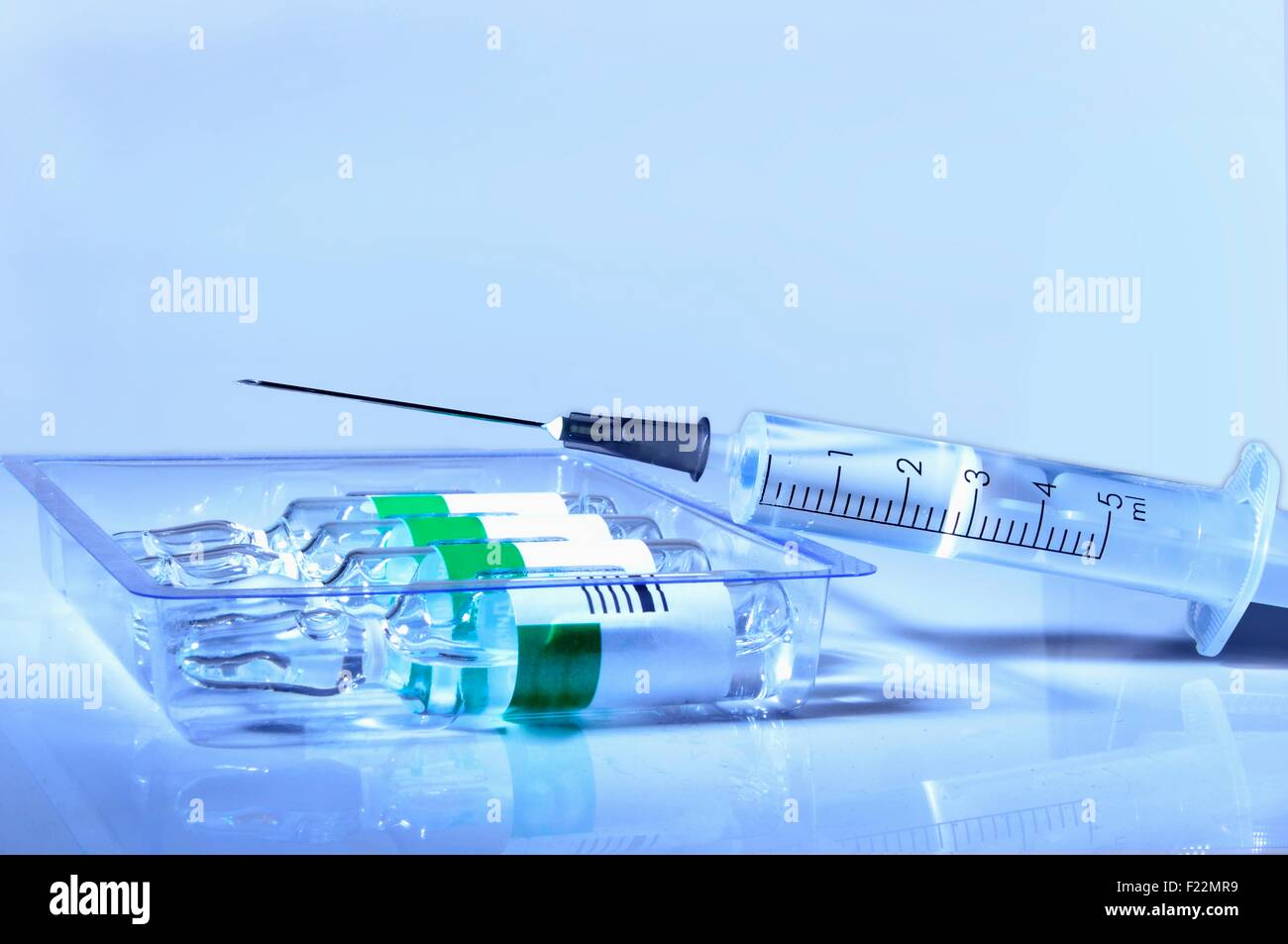 plastic medical syringe and ampoule with needle before make drug ...