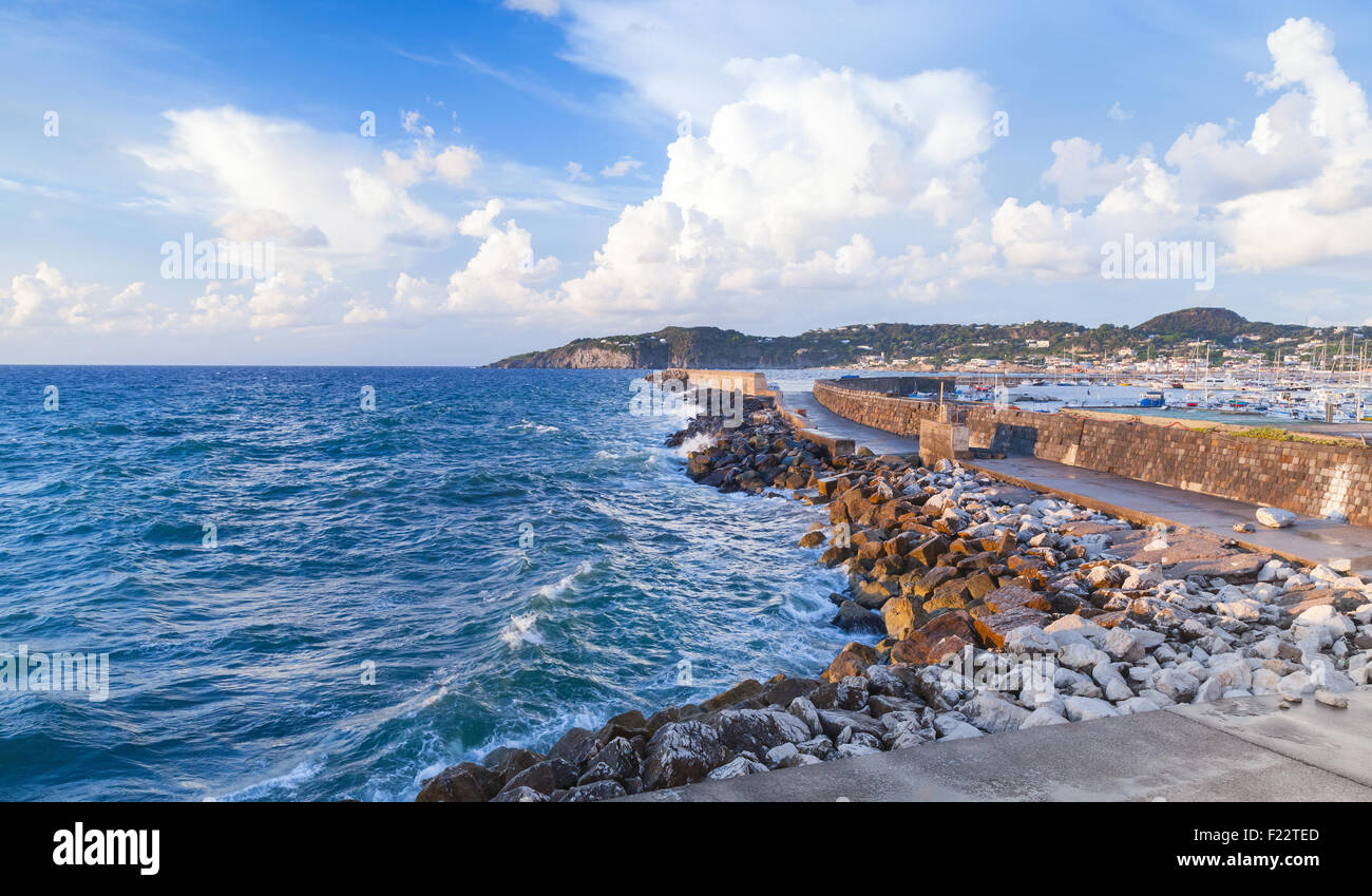 Coastal landscape with port entrance. Forio of Ischia, a town in the ...