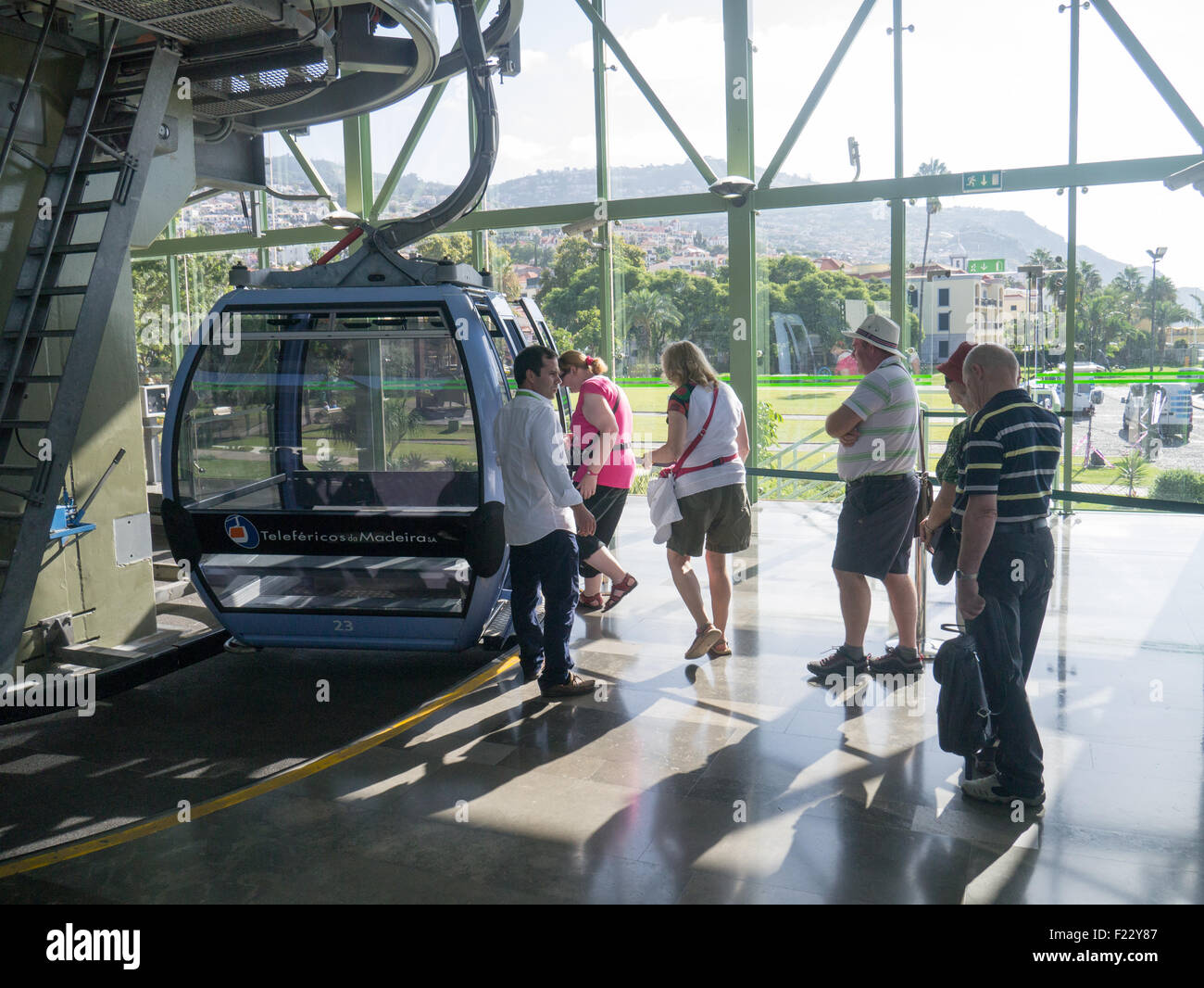 Tourists boarding the cable car to Monte from the main station in ...