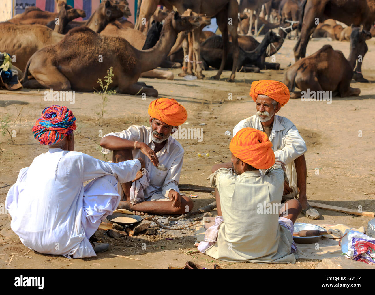 PUSHKAR, INDIA - NOVEMBER 21: An unidentified men attends the Pushkar ...