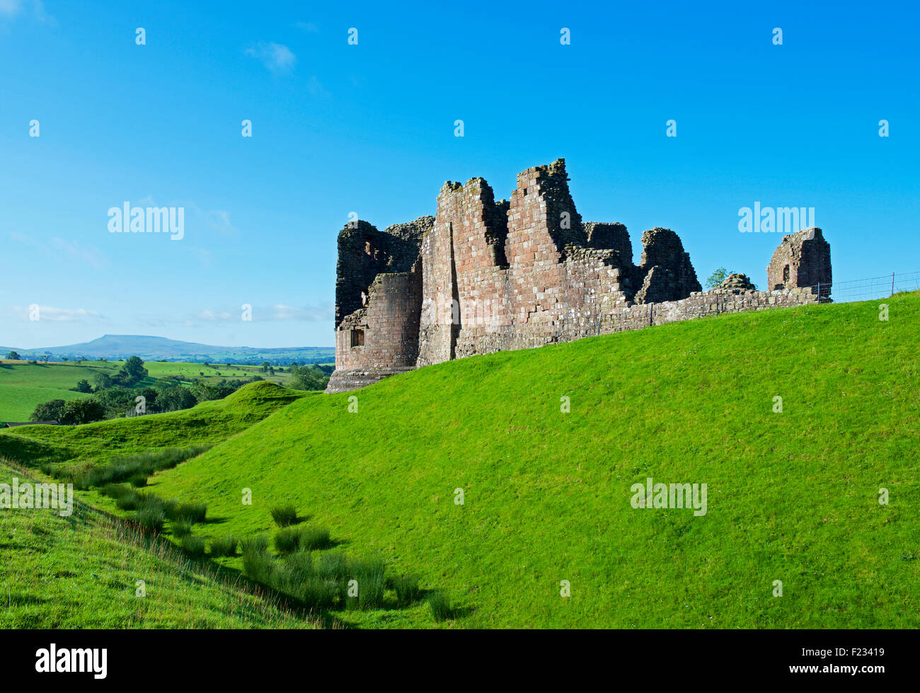 Ruins of Brough Castle, Cumbria, England UK, with Wild Boar Fell in the ...