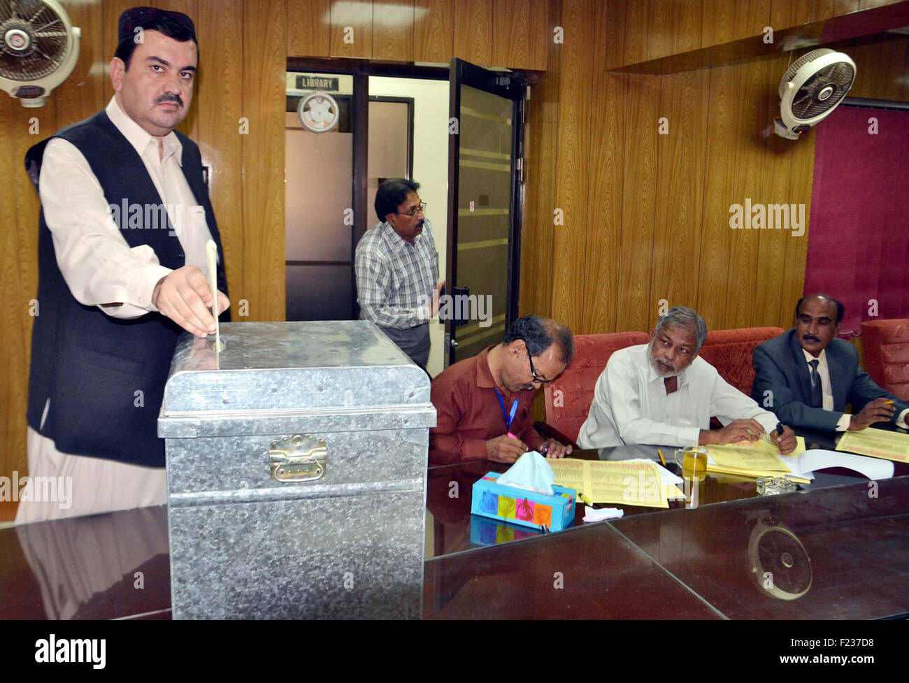 Voter casts his vote during Annual Election of Balochistan Chamber of ...
