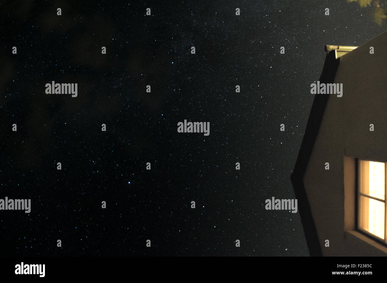 Night sky over a country house Stock Photo - Alamy