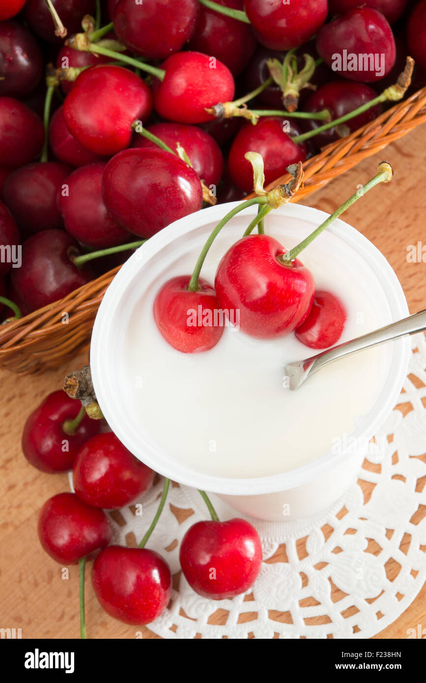 low-fat plain yogurt creamy cherries flavor Stock Photo - Alamy
