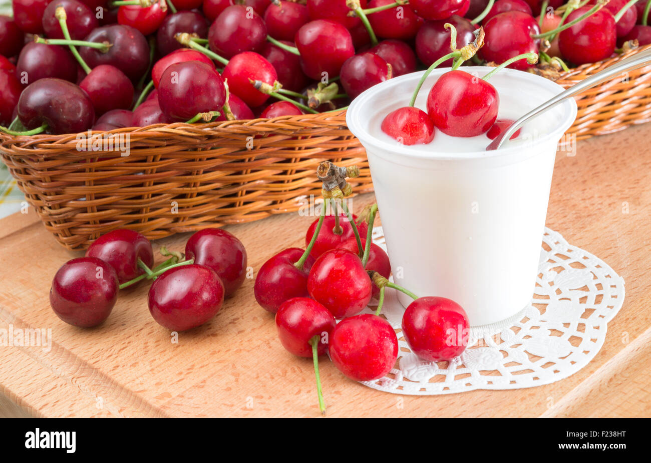low-fat plain yogurt creamy cherries flavor Stock Photo - Alamy