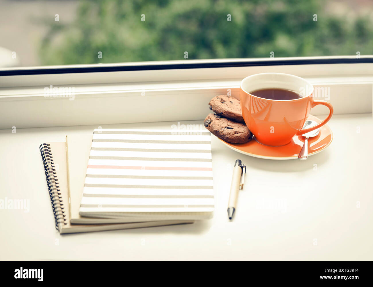Cup of tea on the window Stock Photo - Alamy