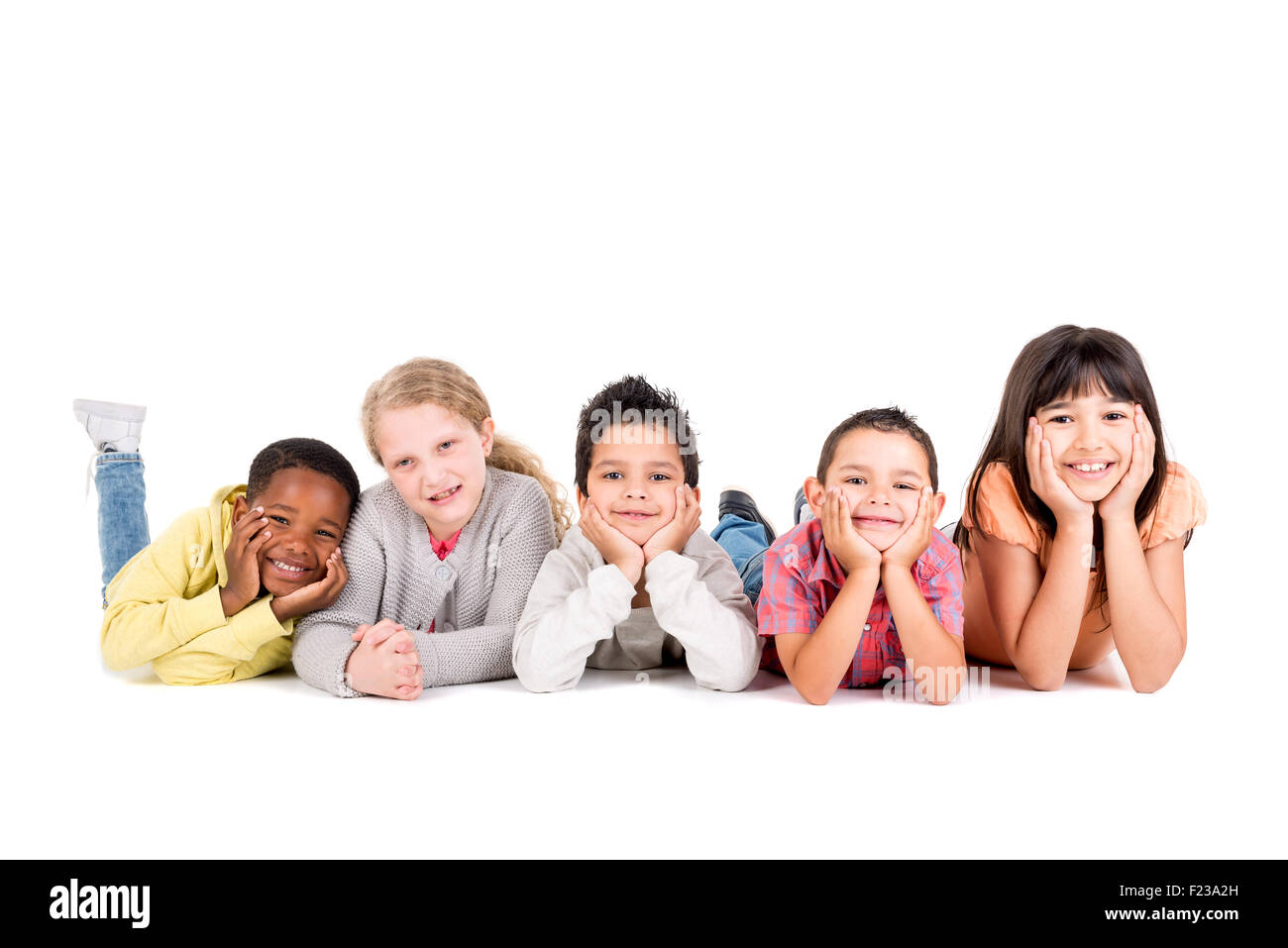 Group of happy children posing isolated in white Stock Photo - Alamy