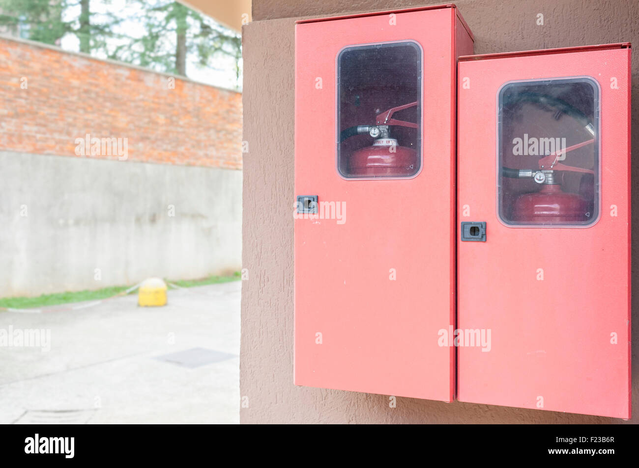 Red fire extinguishers hi-res stock photography and images - Alamy