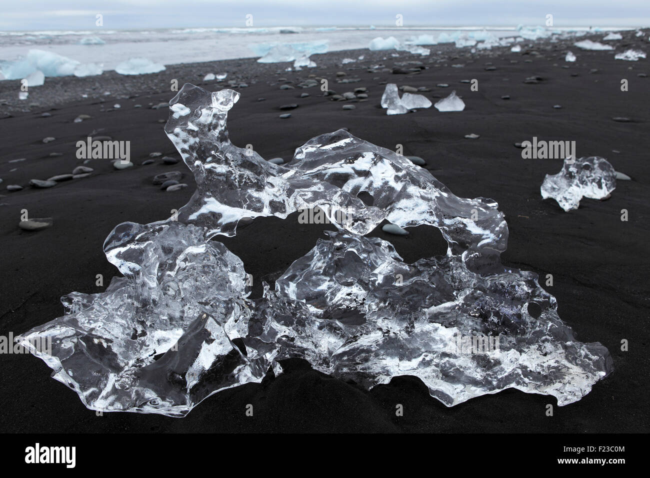 Ice litters the beach by Jökulsárlón, a glacial lake near Vatnajökull ...